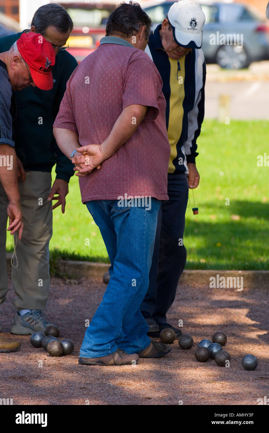 Men playing boules at Etaples France Stock Photo - Alamy