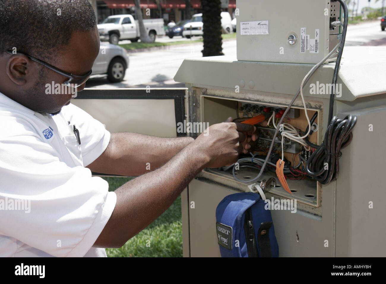 Miami Beach Florida,Black male technician,traffic,road,sign,safety ...