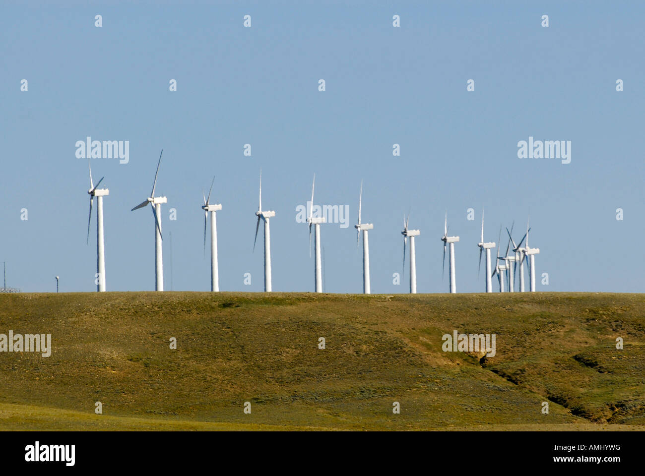 Wind powered turbine windmills in Wyoming WY Stock Photo - Alamy