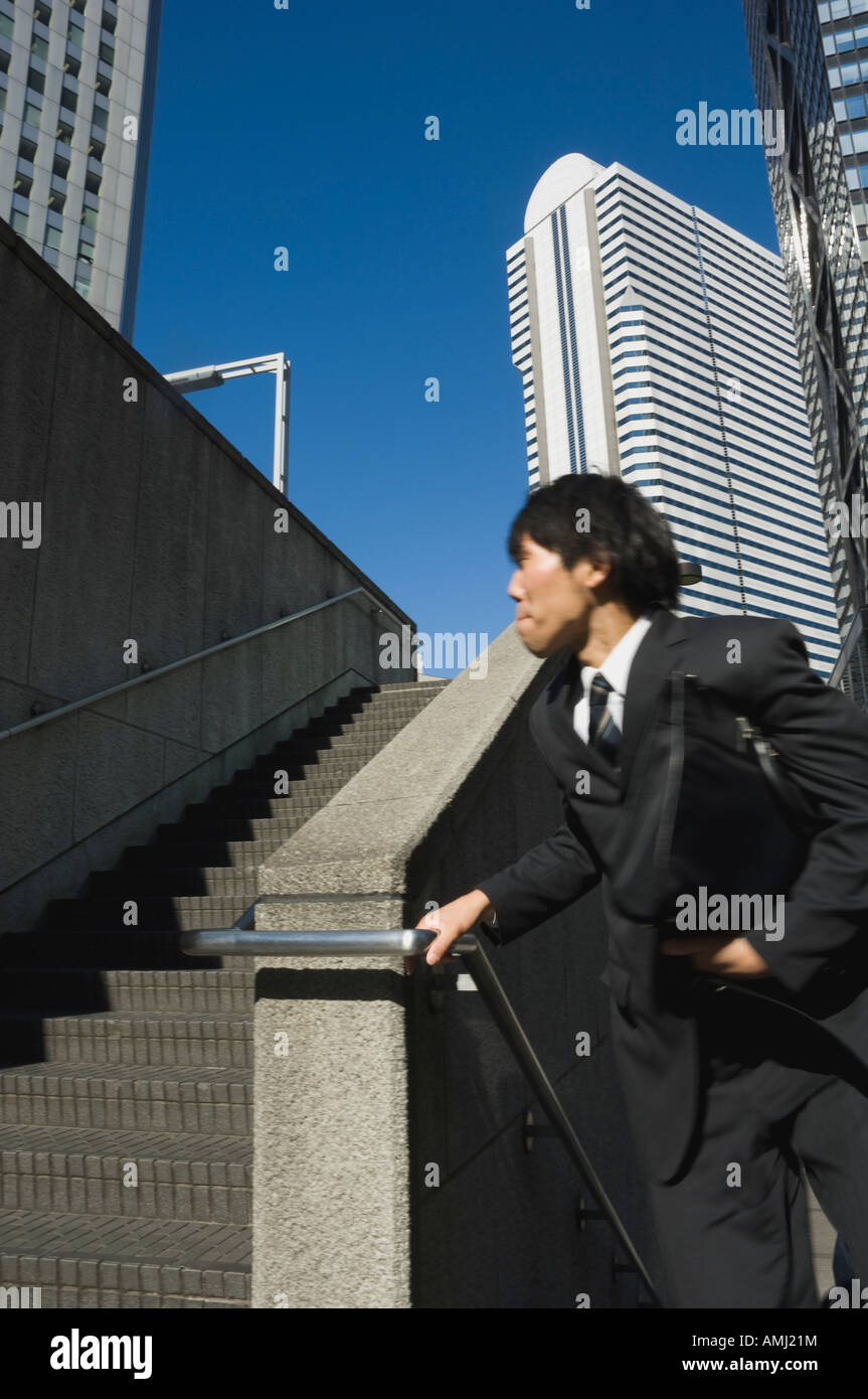 Business person running steps hi-res stock photography and images - Alamy