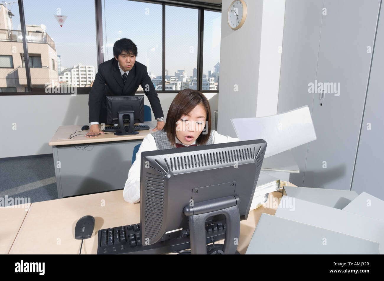 Busy office worker Stock Photo - Alamy