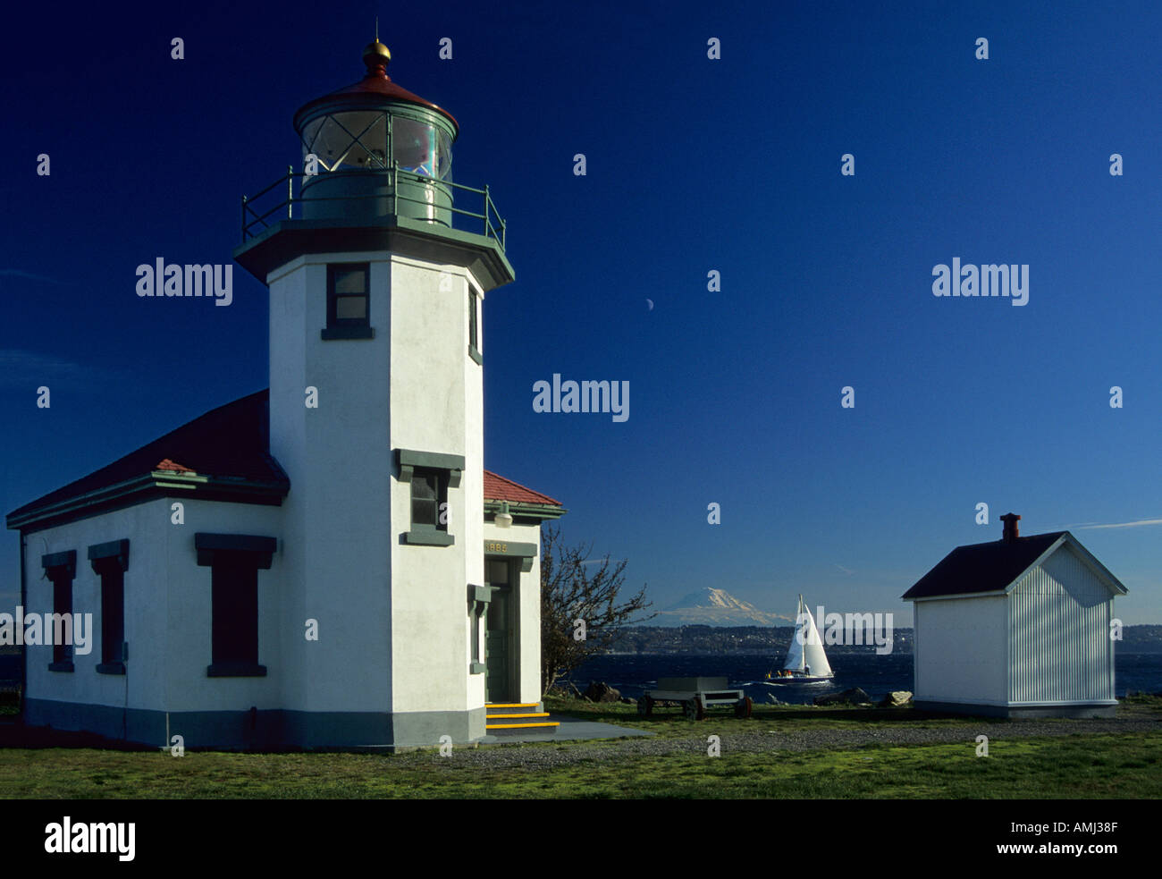 Point Robinson Lighthouse Mount Rainier and Sailboat Stock Photo - Alamy
