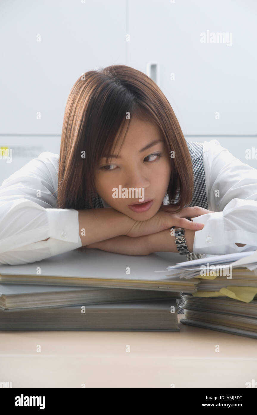 Tired office worker Stock Photo - Alamy