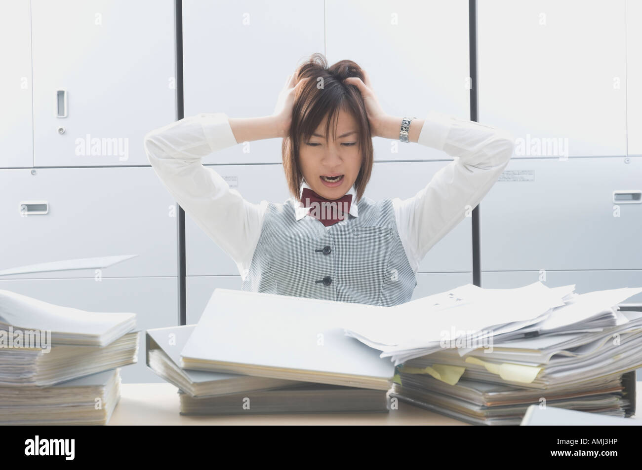 Frustrated office worker Stock Photo - Alamy
