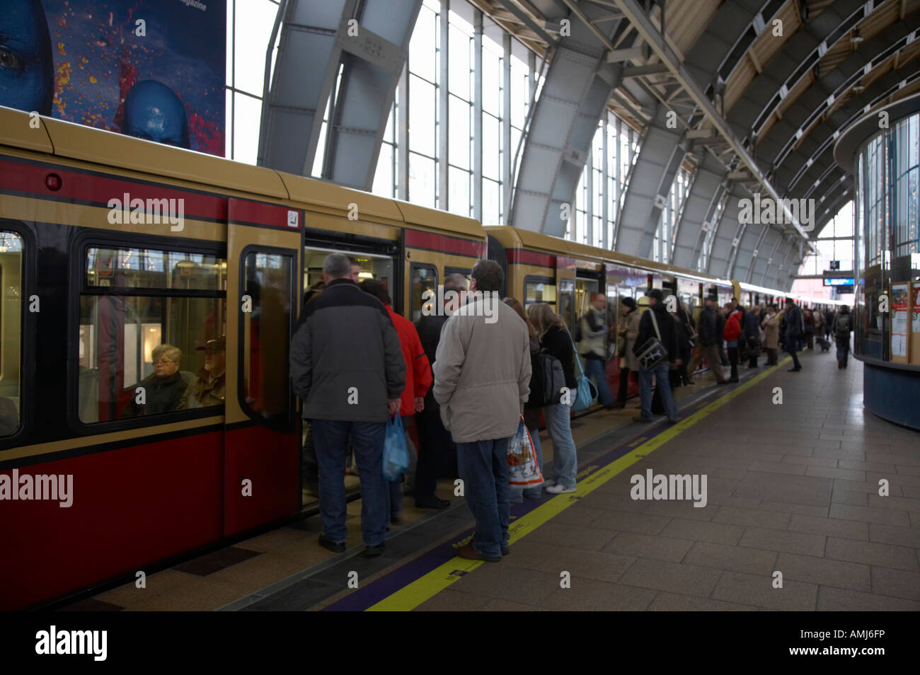 passengers board Berlin S Bahn train platform at Alexanderplatz main ...