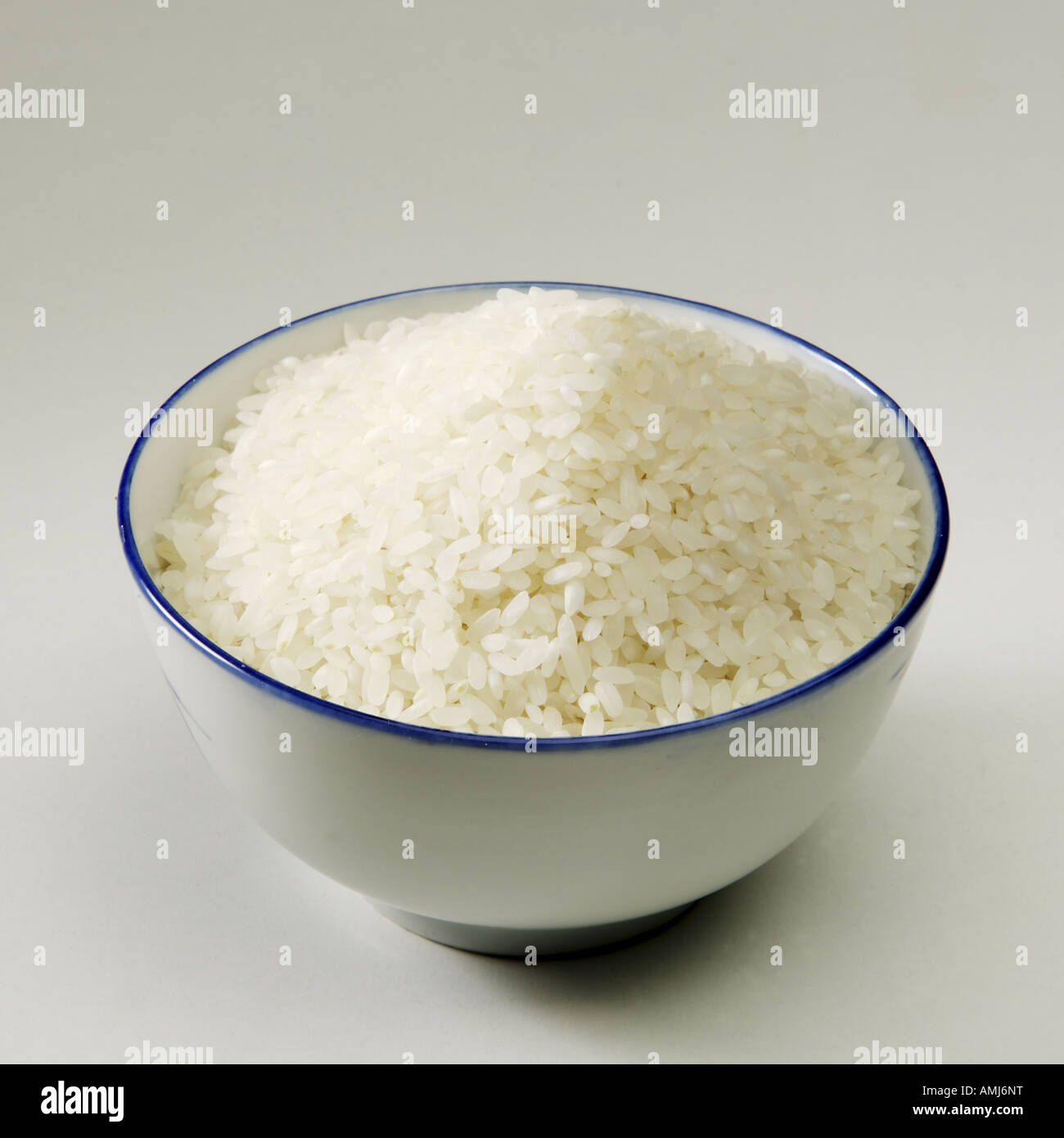 Bowl with rice Stock Photo - Alamy