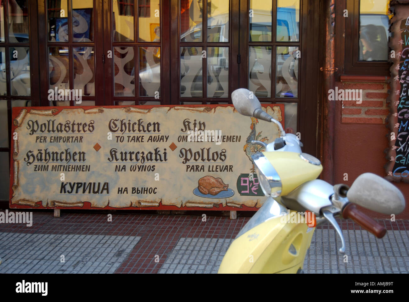 characteristic restaurant front with moped Calella Spain Stock Photo ...