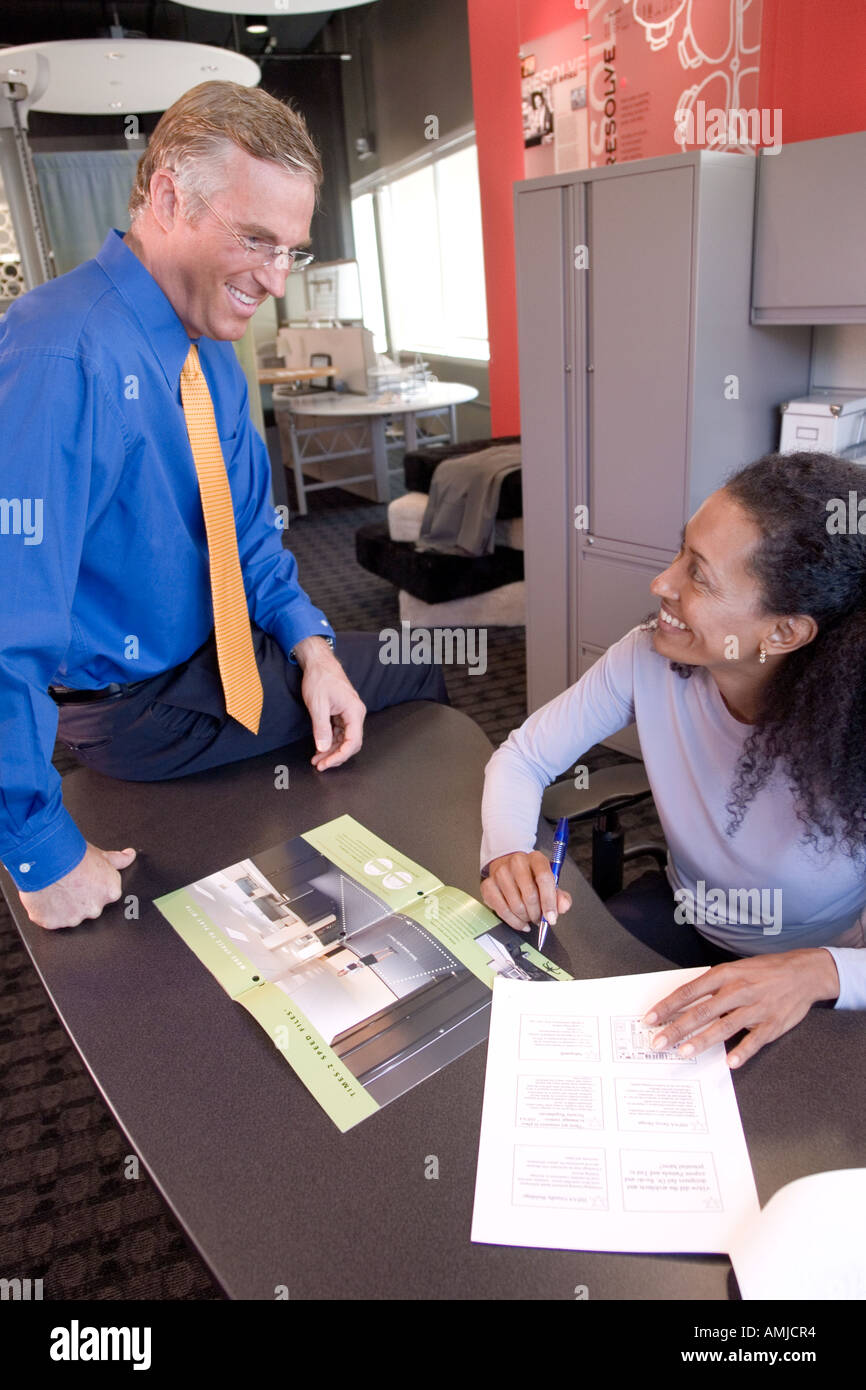 Two business people at a meeting Stock Photo - Alamy