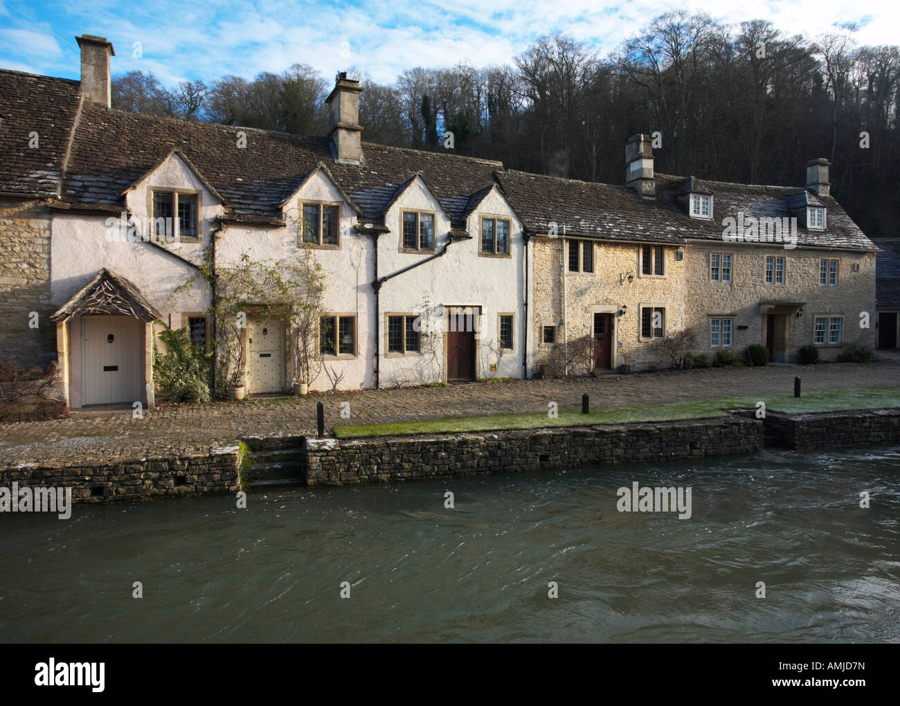 The village of castle combe on the river bybrook hi-res stock ...