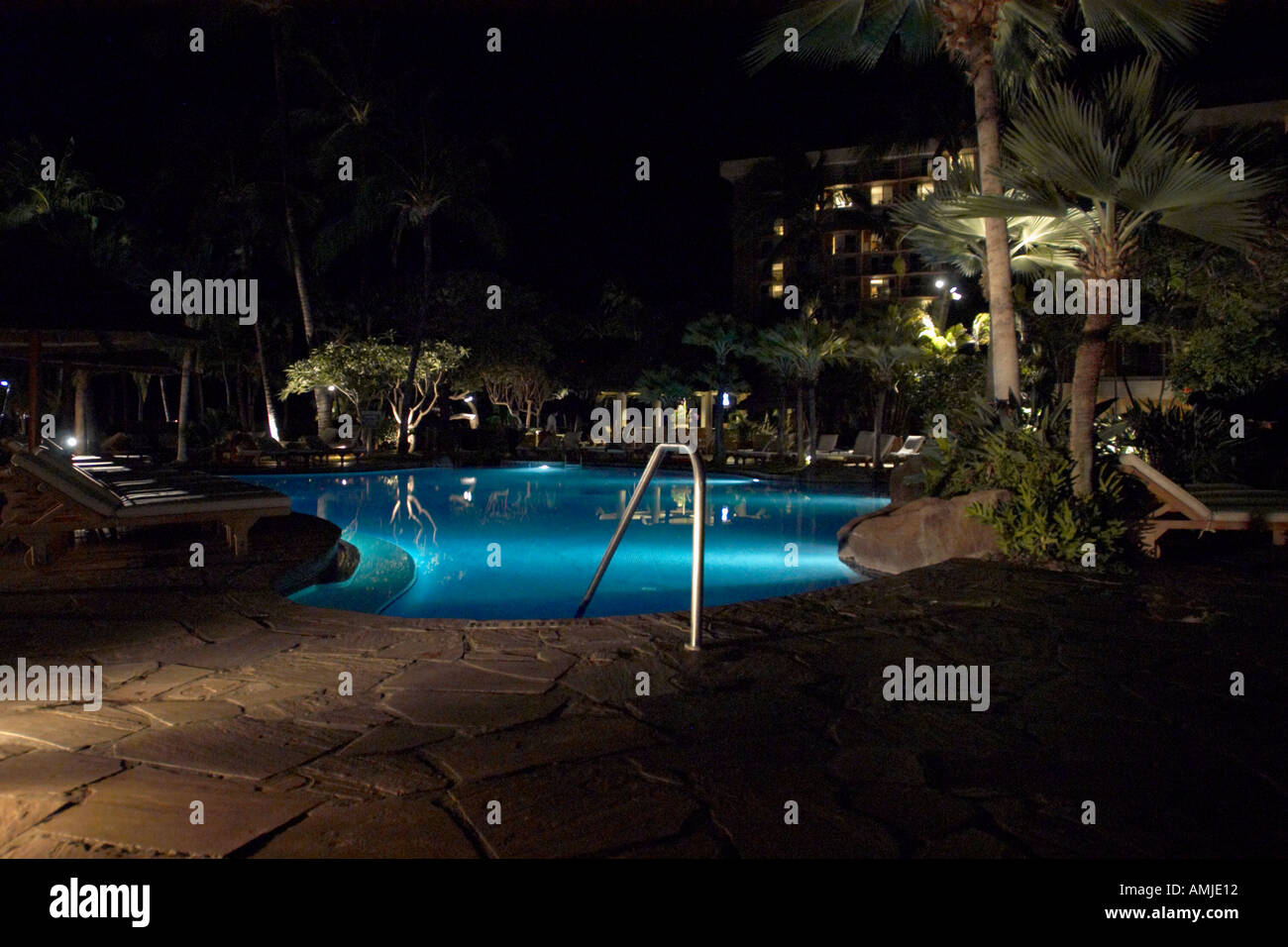 Swimming pool at night Stock Photo - Alamy
