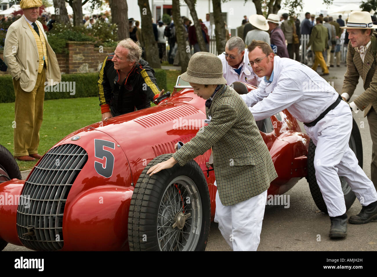 1938 Alfa Romeo 308C is wheeled through the paddock in preparation for ...