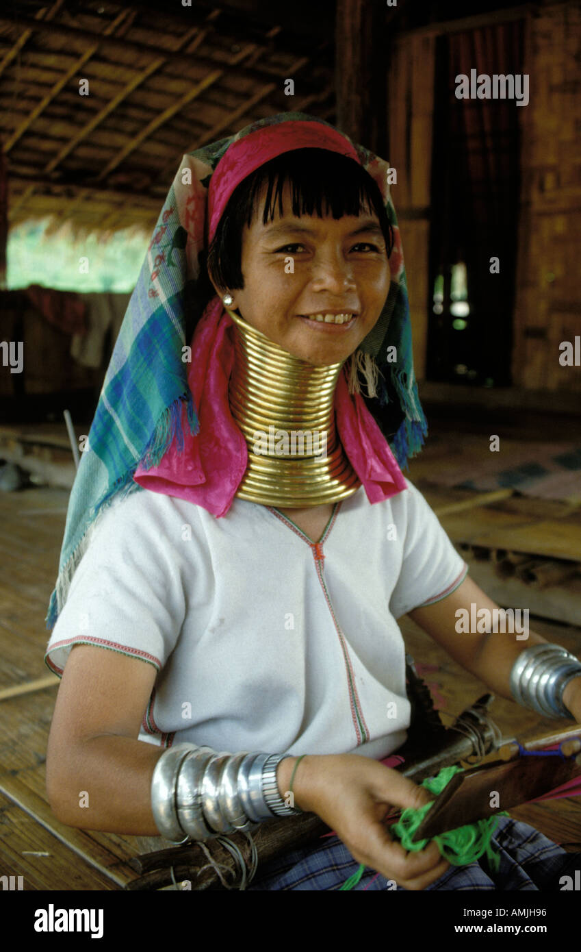 A longneck woman from the karen tribe weaving Stock Photo - Alamy