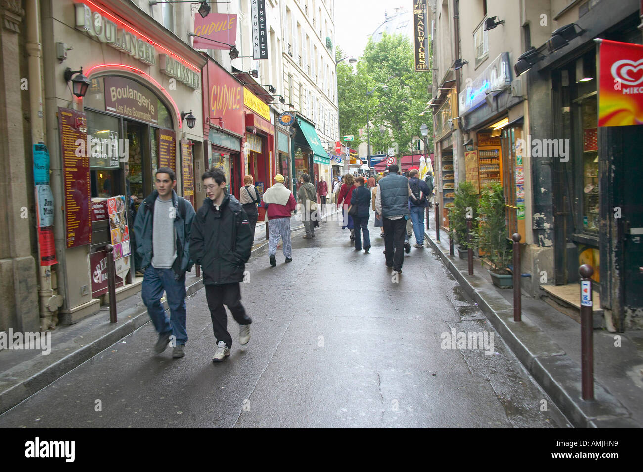 Street with fast food or take out restaurants Paris France Stock Photo ...