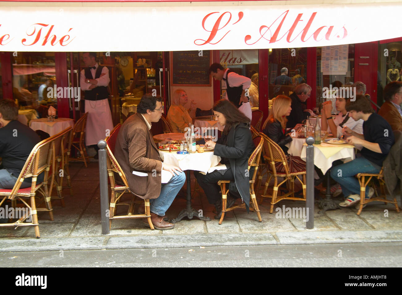 Outdoor Seating under awning at café Paris France Stock Photo - Alamy