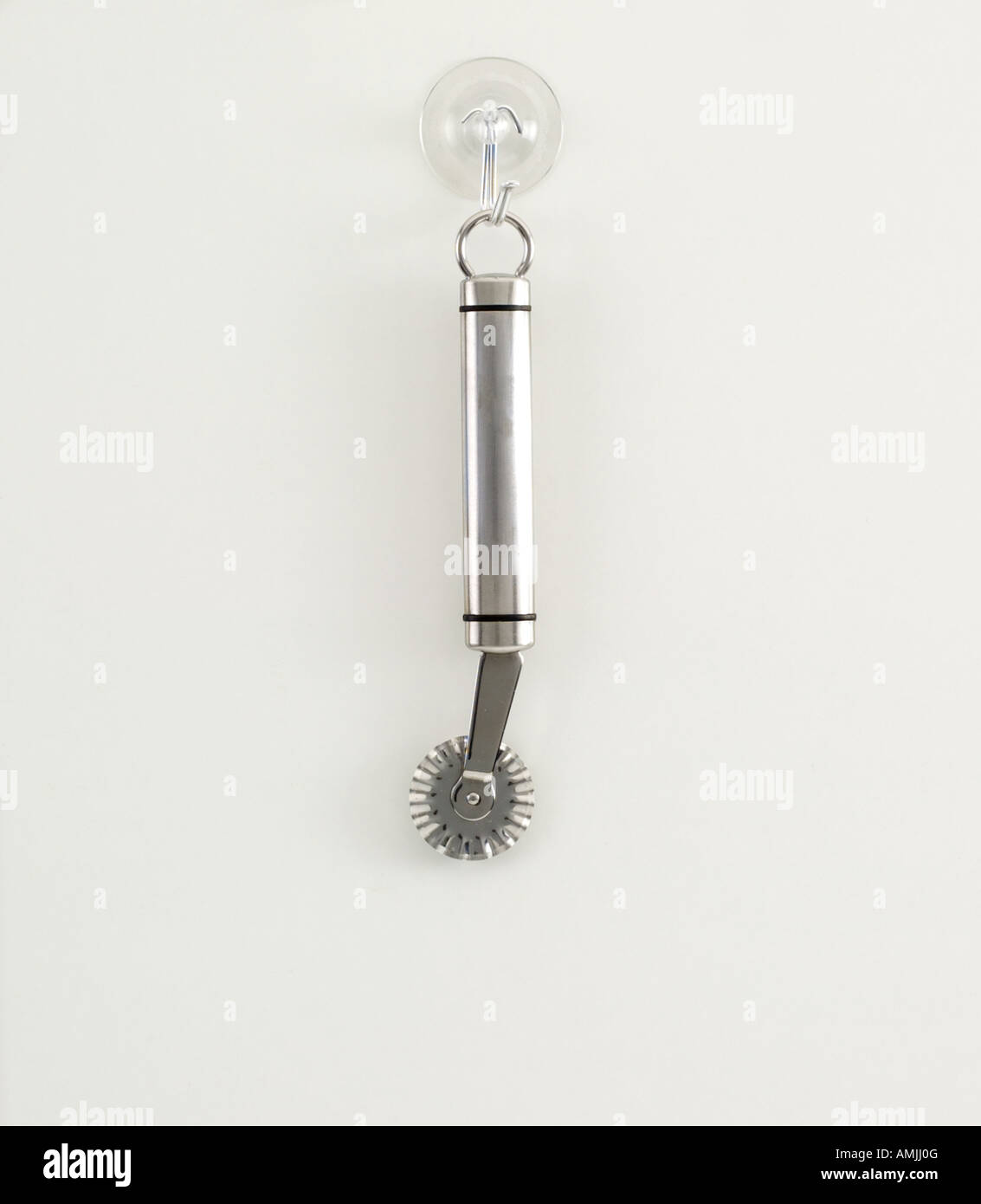 Instrument to cut pizza Stock Photo - Alamy