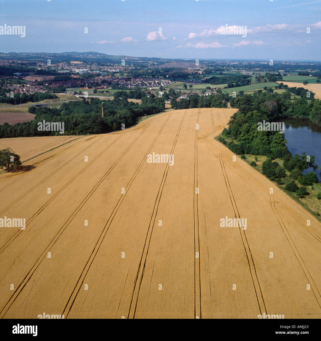 Harvest crops in field aerial view UK Stock Photo - Alamy