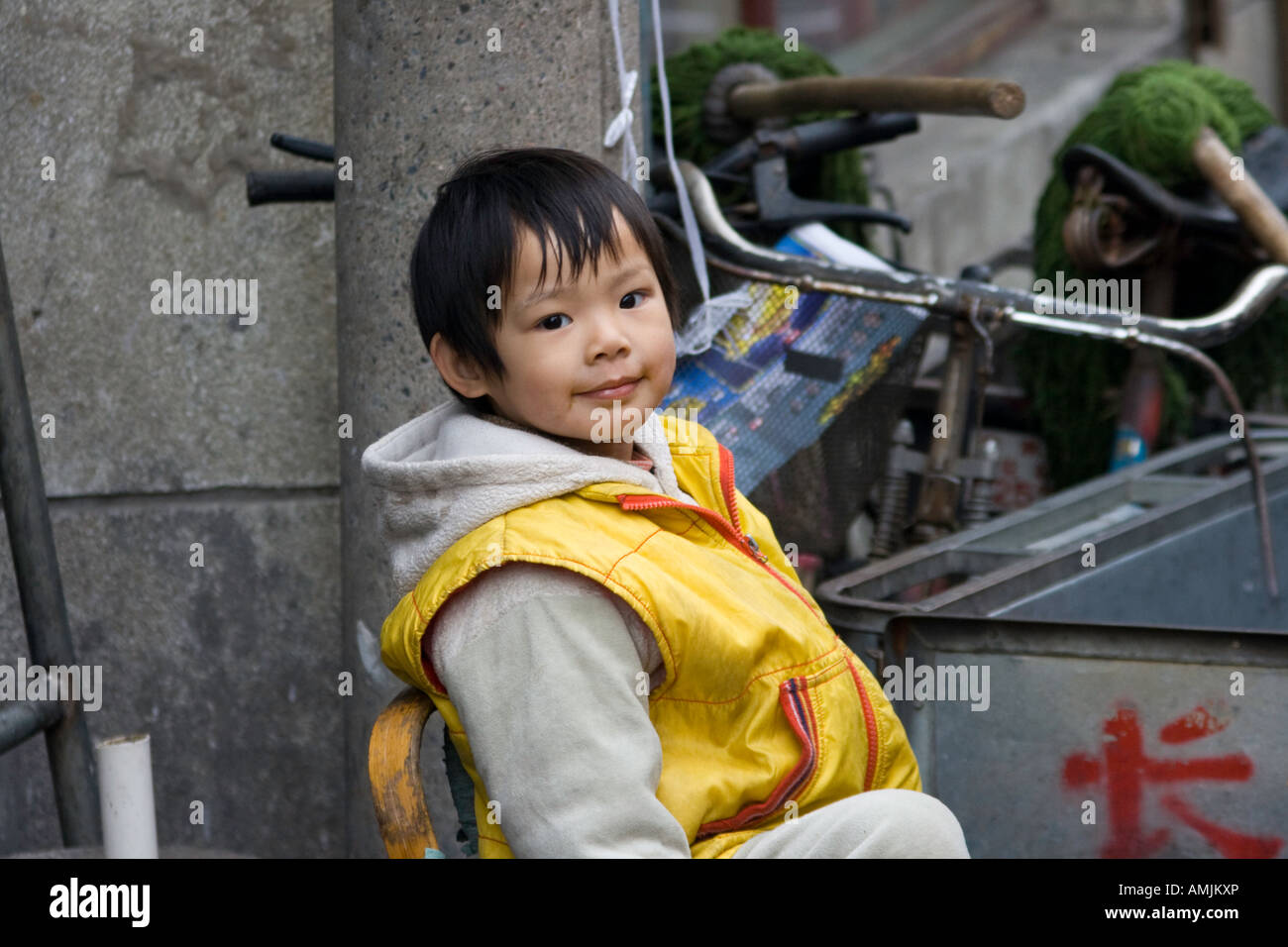 Chinese Boy Playing in the Hutong Beijing China Stock Photo - Alamy