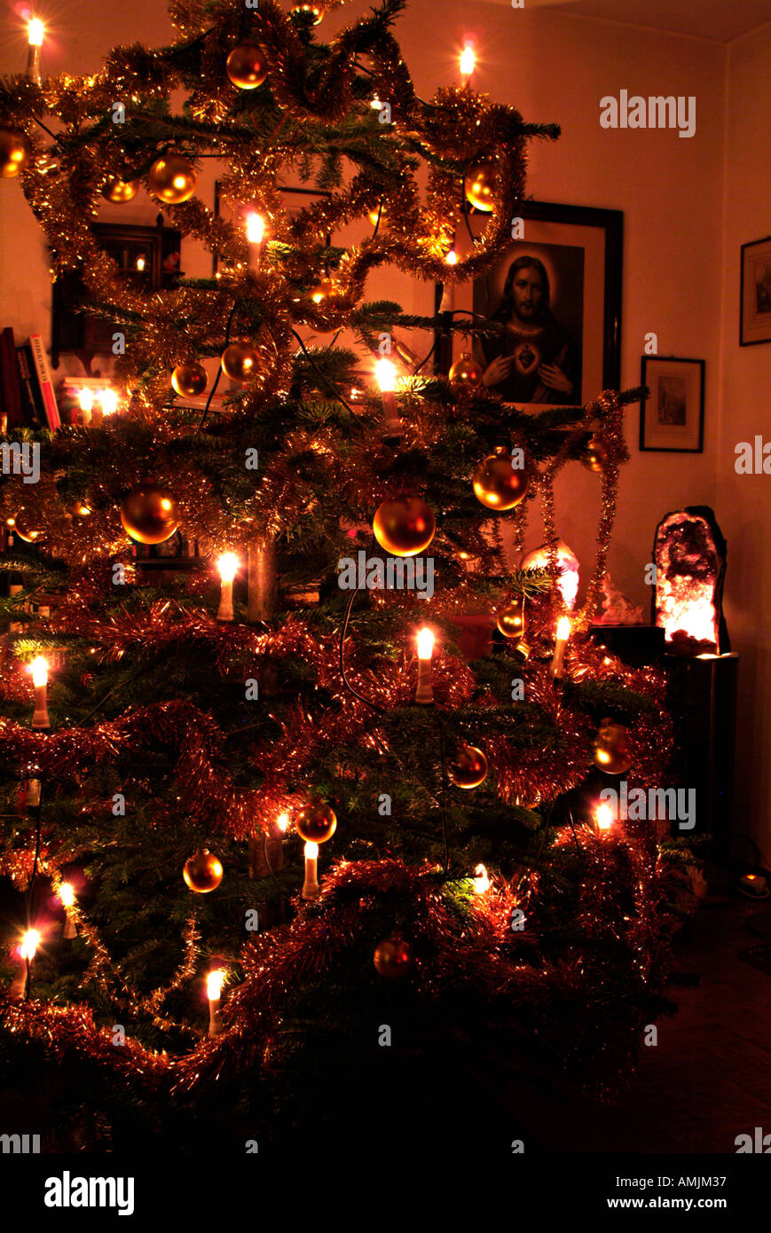 PR Christmas tree with lights in the background a picture of Jesus ...