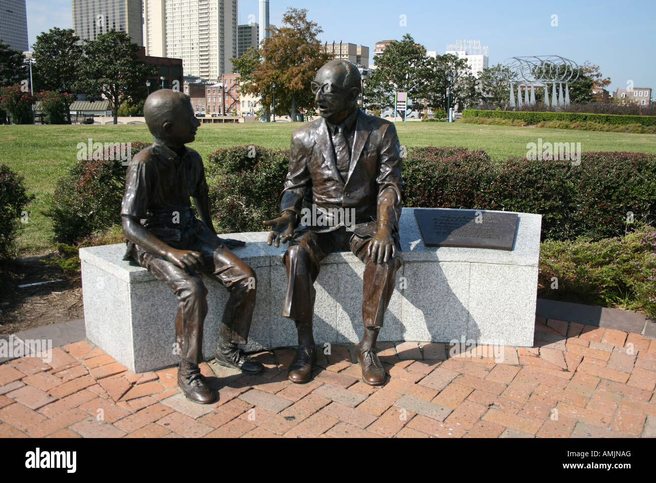 metal statue of Malcolm Woldenberg in Woldenberg riverfront park ...