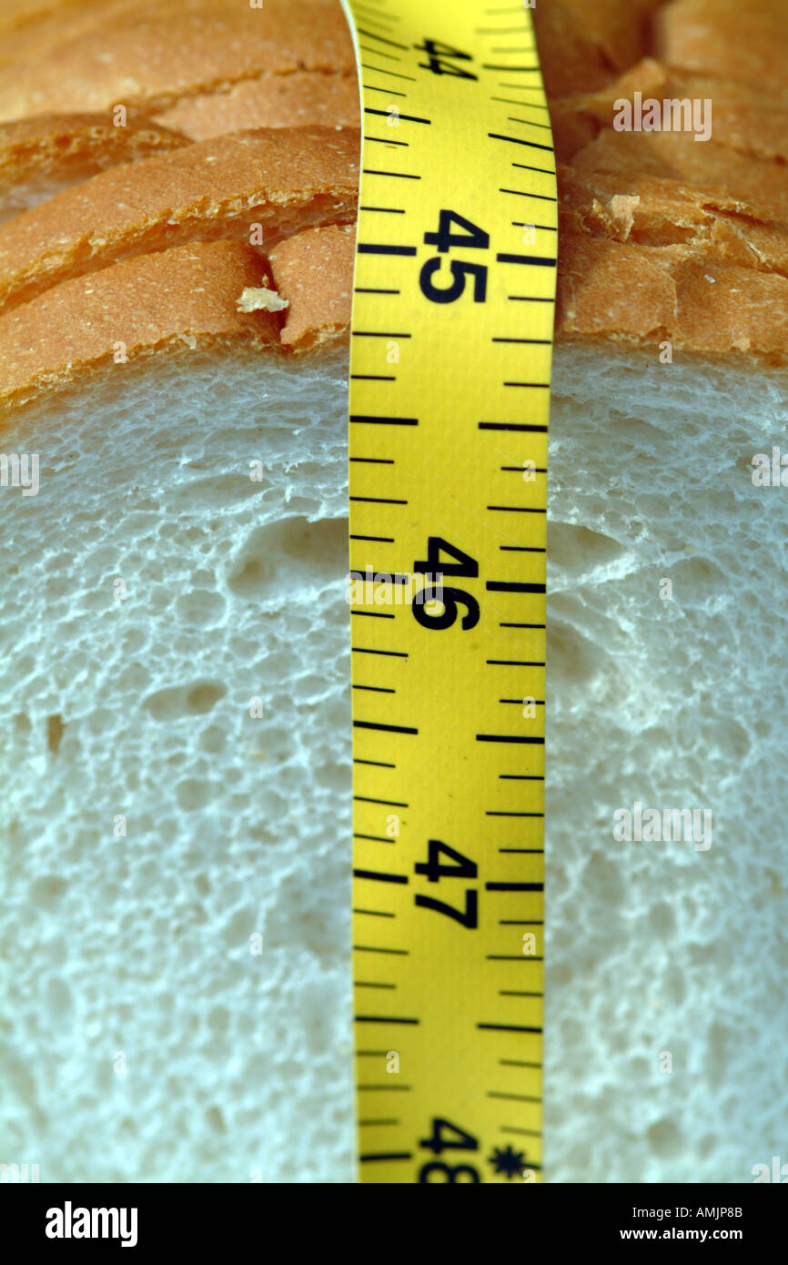 bread with a tape measure Stock Photo - Alamy