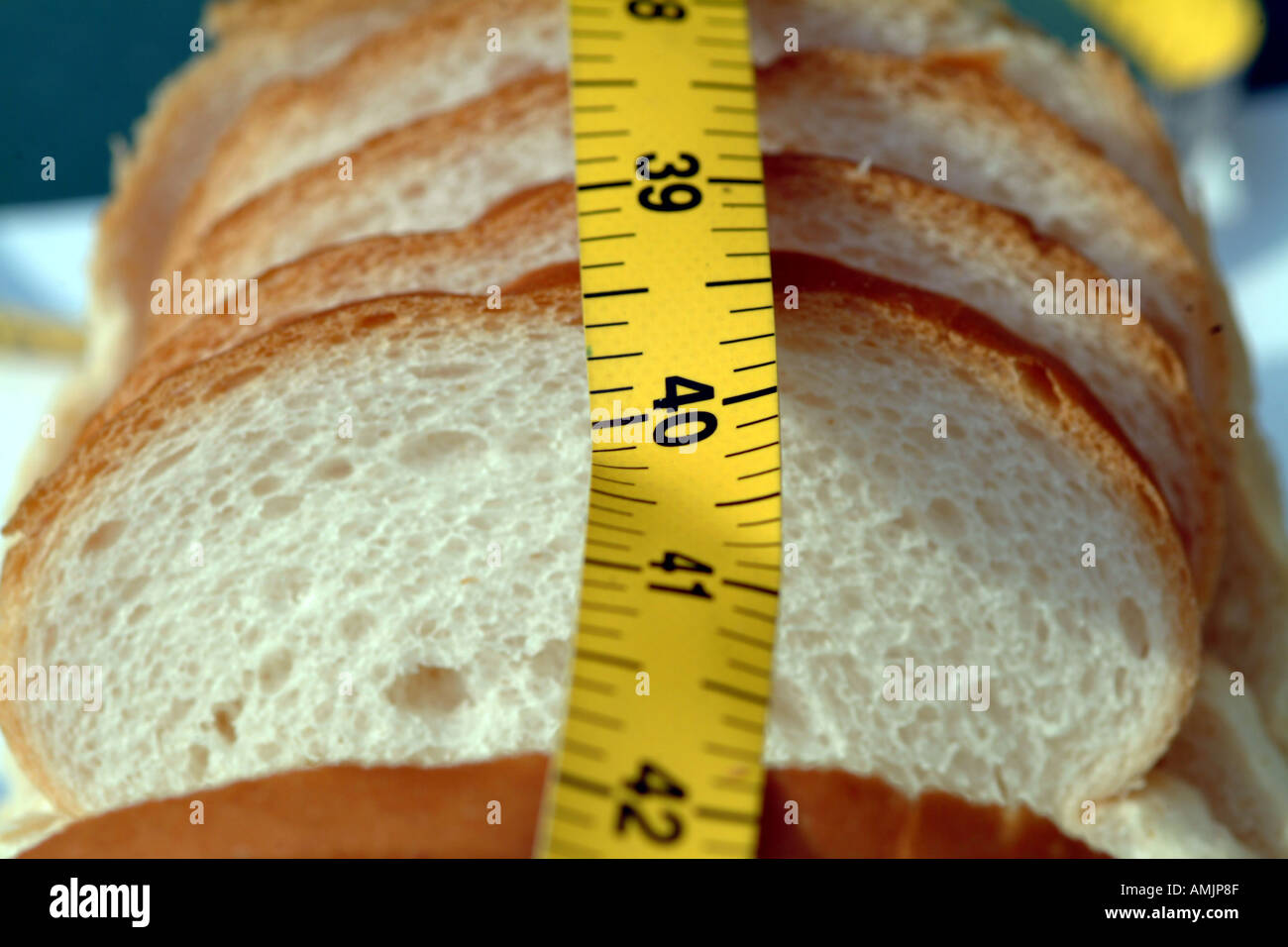 bread with a tape measure Stock Photo - Alamy