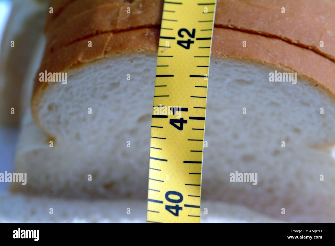 bread with a tape measure Stock Photo - Alamy