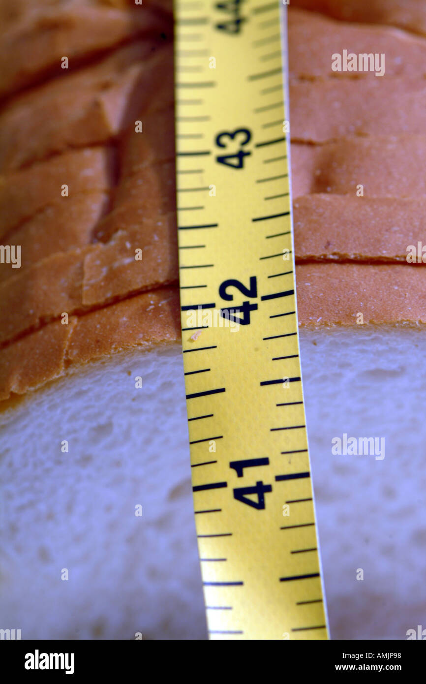 bread with a tape measure Stock Photo - Alamy