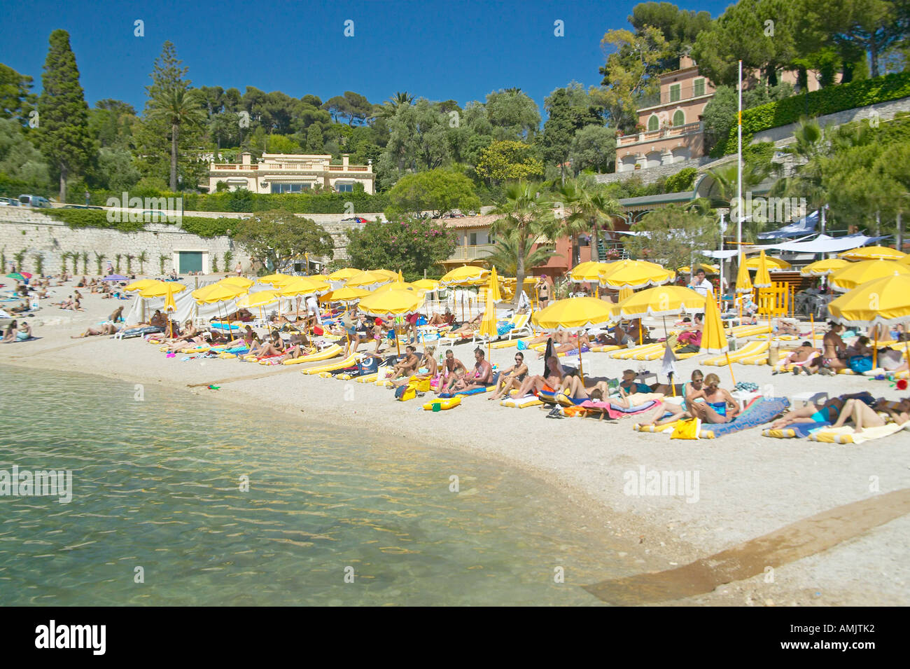 Sunbathers on beach on French Riviera France Stock Photo - Alamy