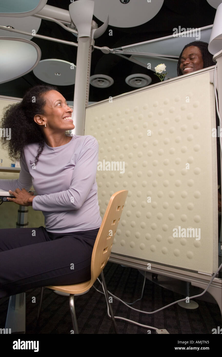 Man spying on female coworker in a office Stock Photo - Alamy