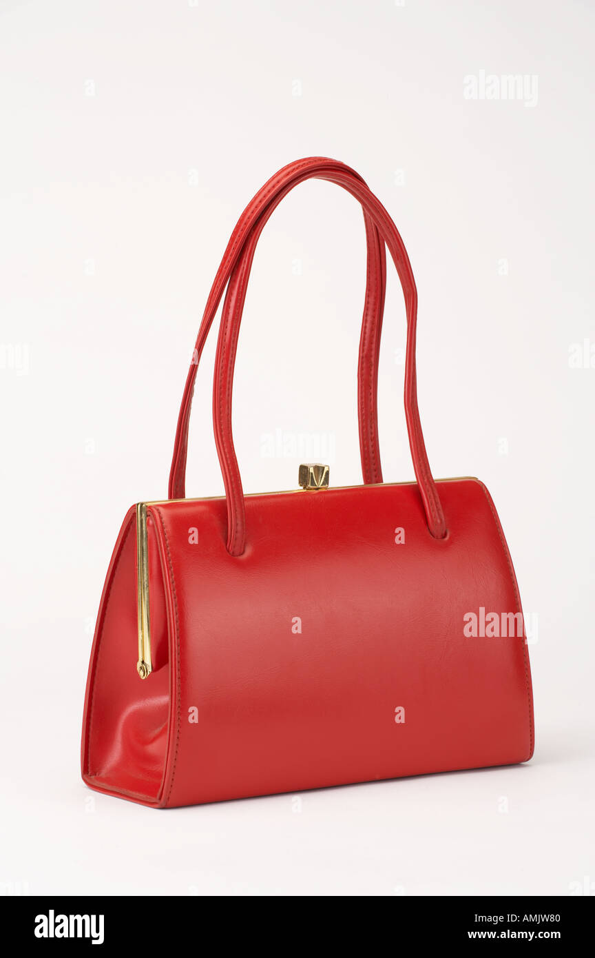 RED LEATHER HANDBAG ON WHITE BACKGROUND Stock Photo - Alamy