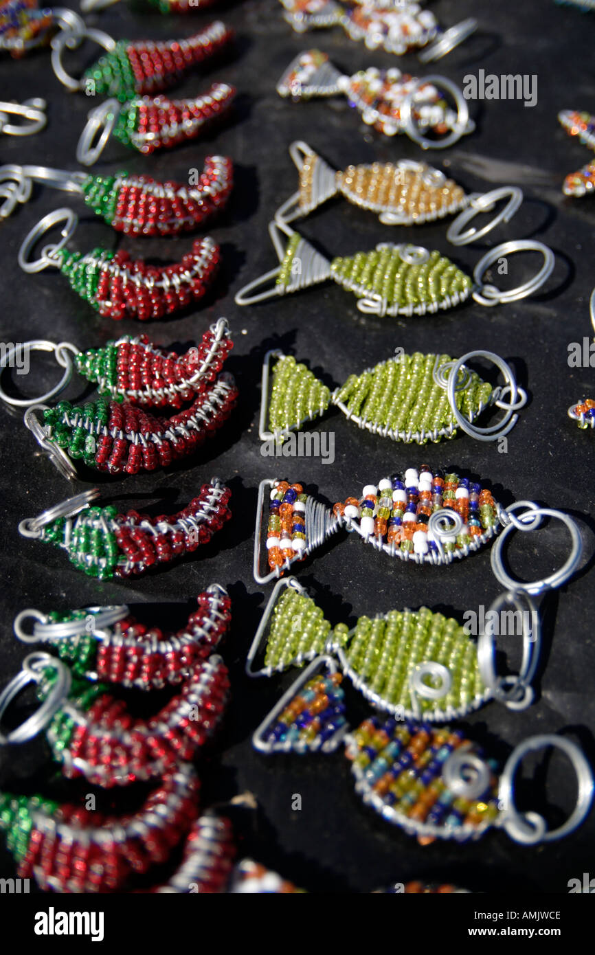 African wire chilli and fish key rings fobs Stock Photo - Alamy