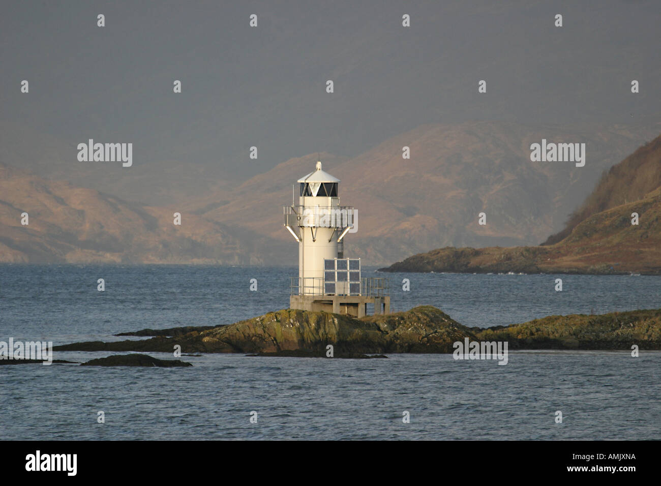 A Stock Photograph of a Lighthouse on an Island in Scotland Stock Photo ...