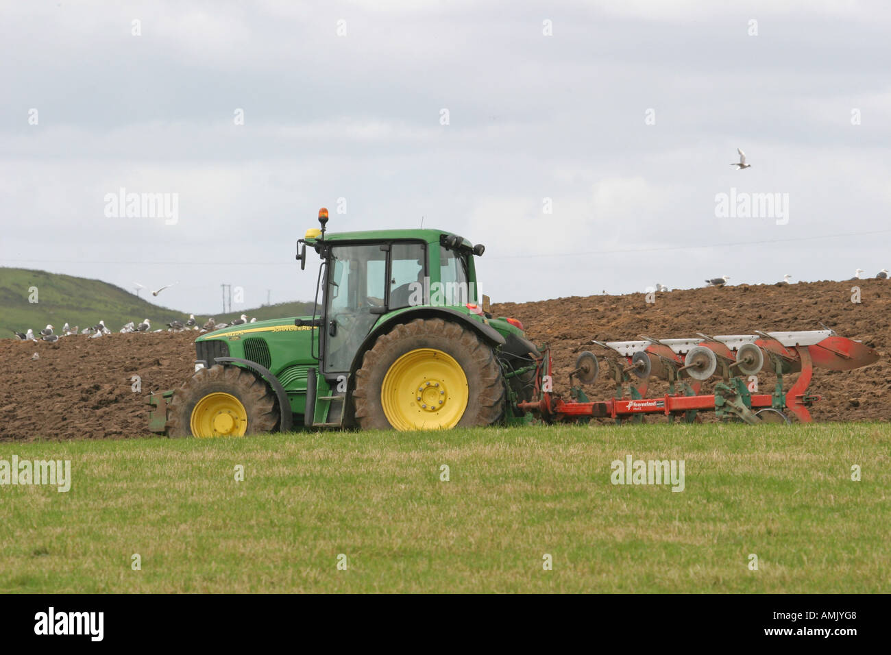 Tractor driven plough hi-res stock photography and images - Alamy
