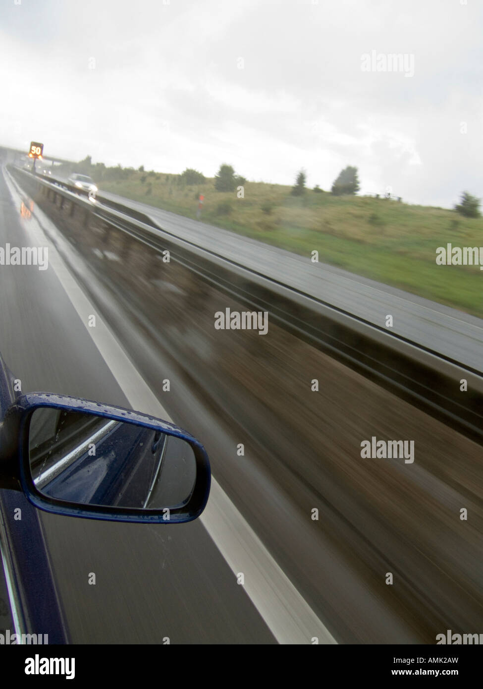 Driving car at speed Stock Photo - Alamy