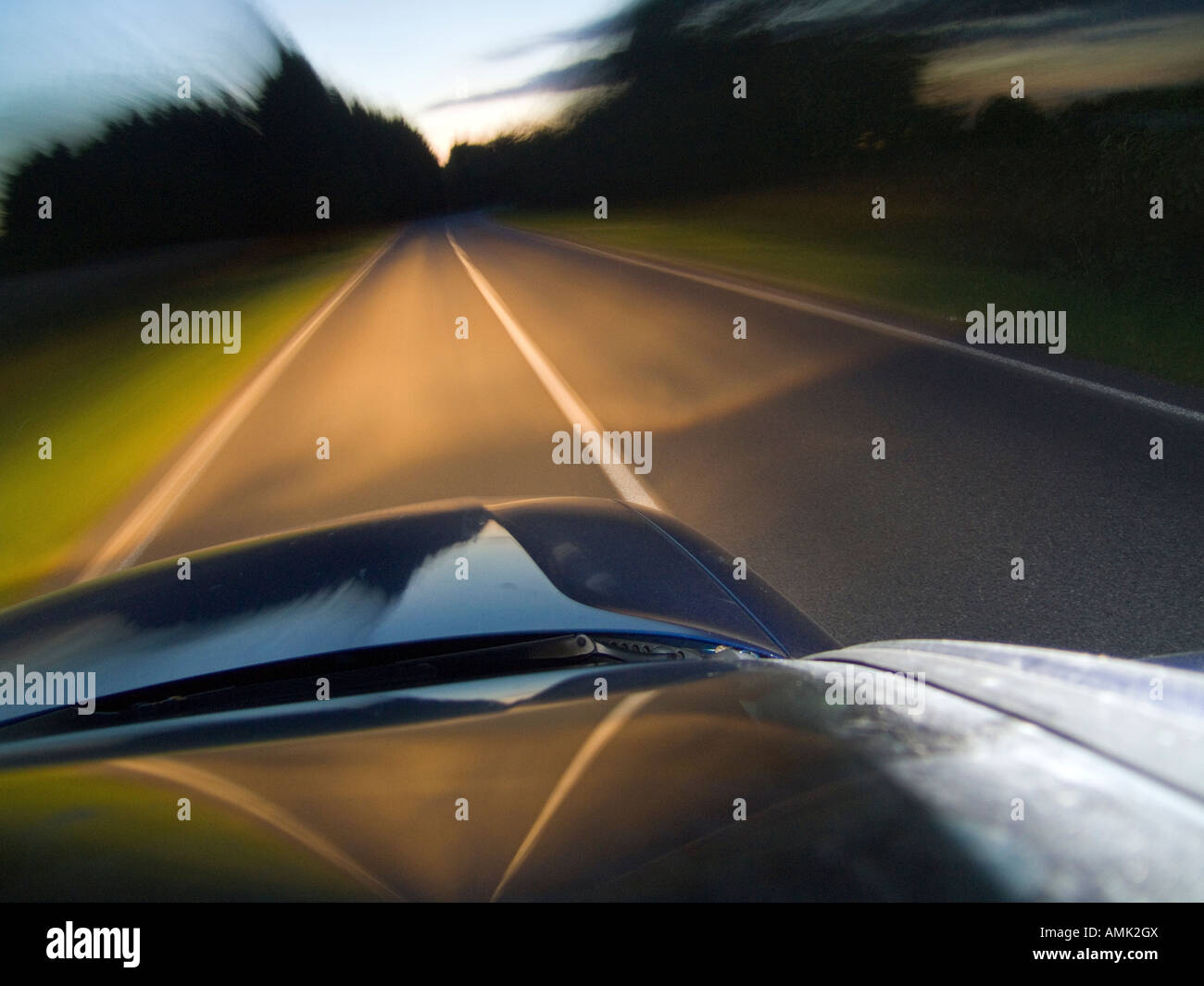 Driving car at speed Stock Photo - Alamy