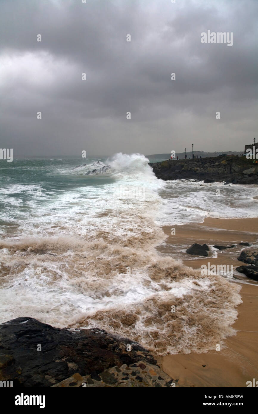 waves breaking onto the shore at st ives in a storm winter cornwall ...