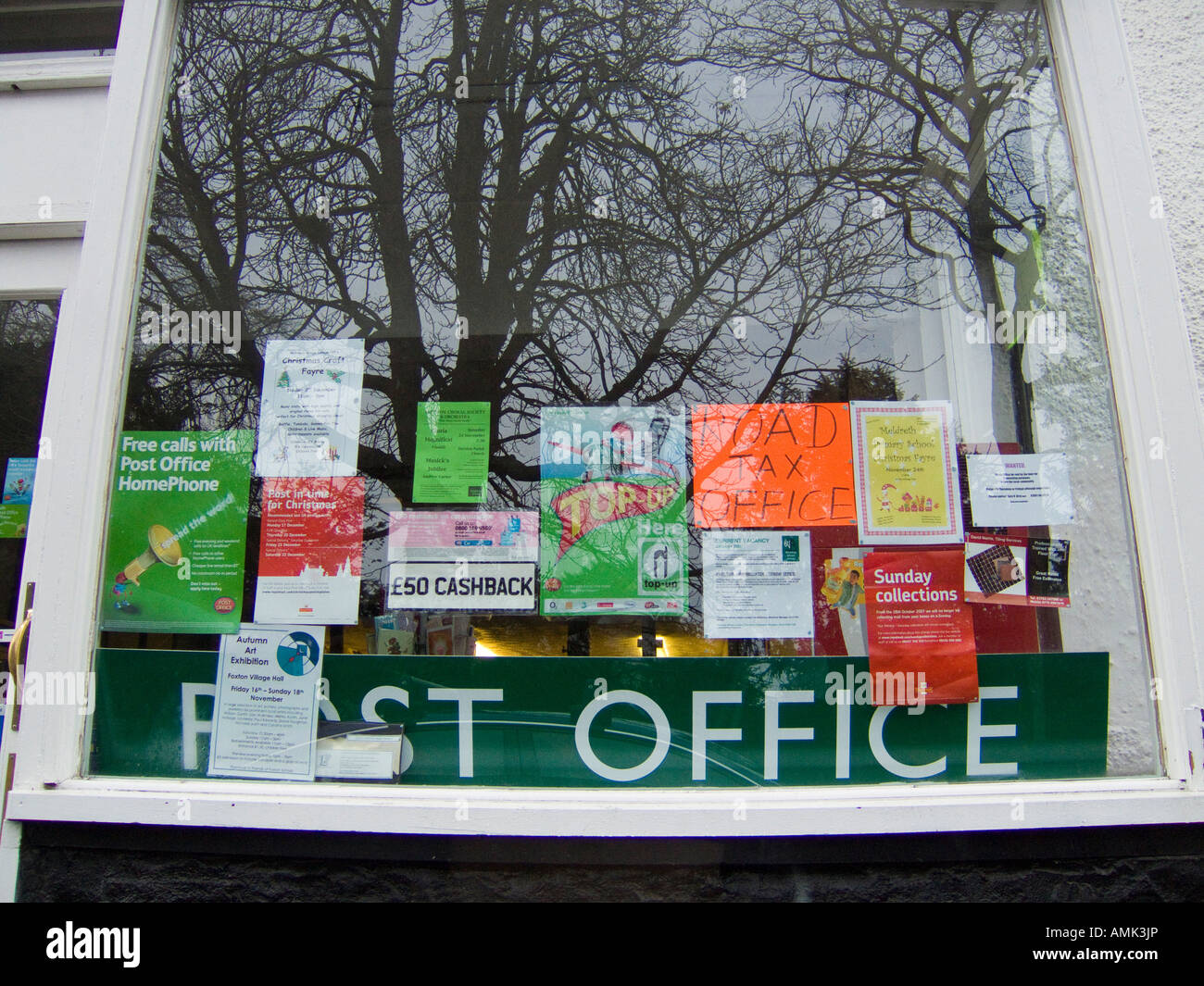 post office shop window in a small village, dark foreboding shadows ...