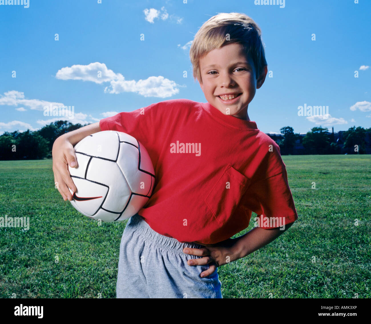 Boy 6 years old portrait with soccer ball Stock Photo - Alamy