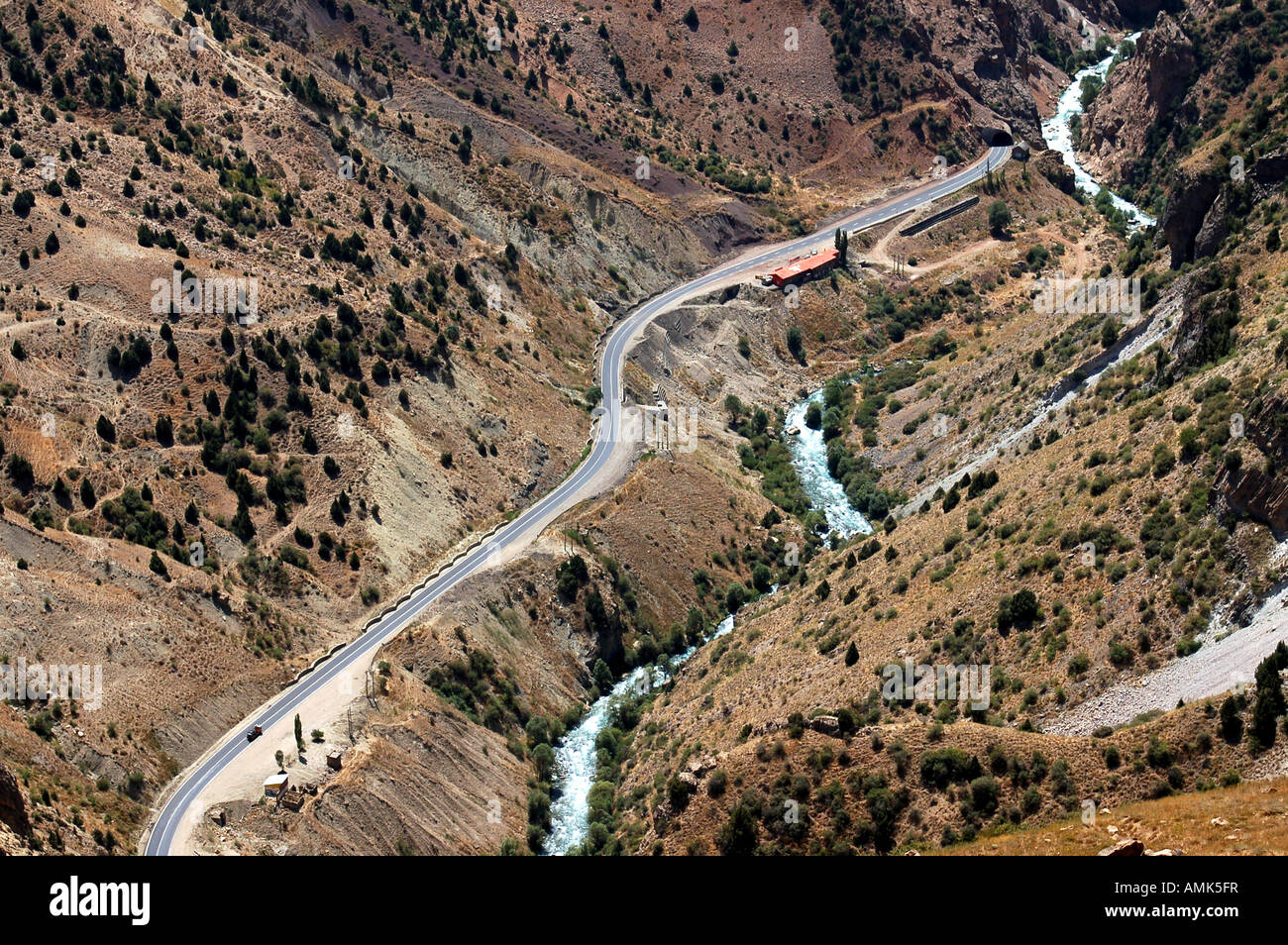 Road and river passing through a valley, north of Tehran, Iran Stock ...
