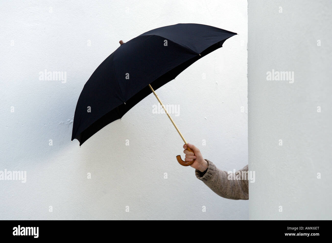 An Umbrella held aloft Stock Photo - Alamy