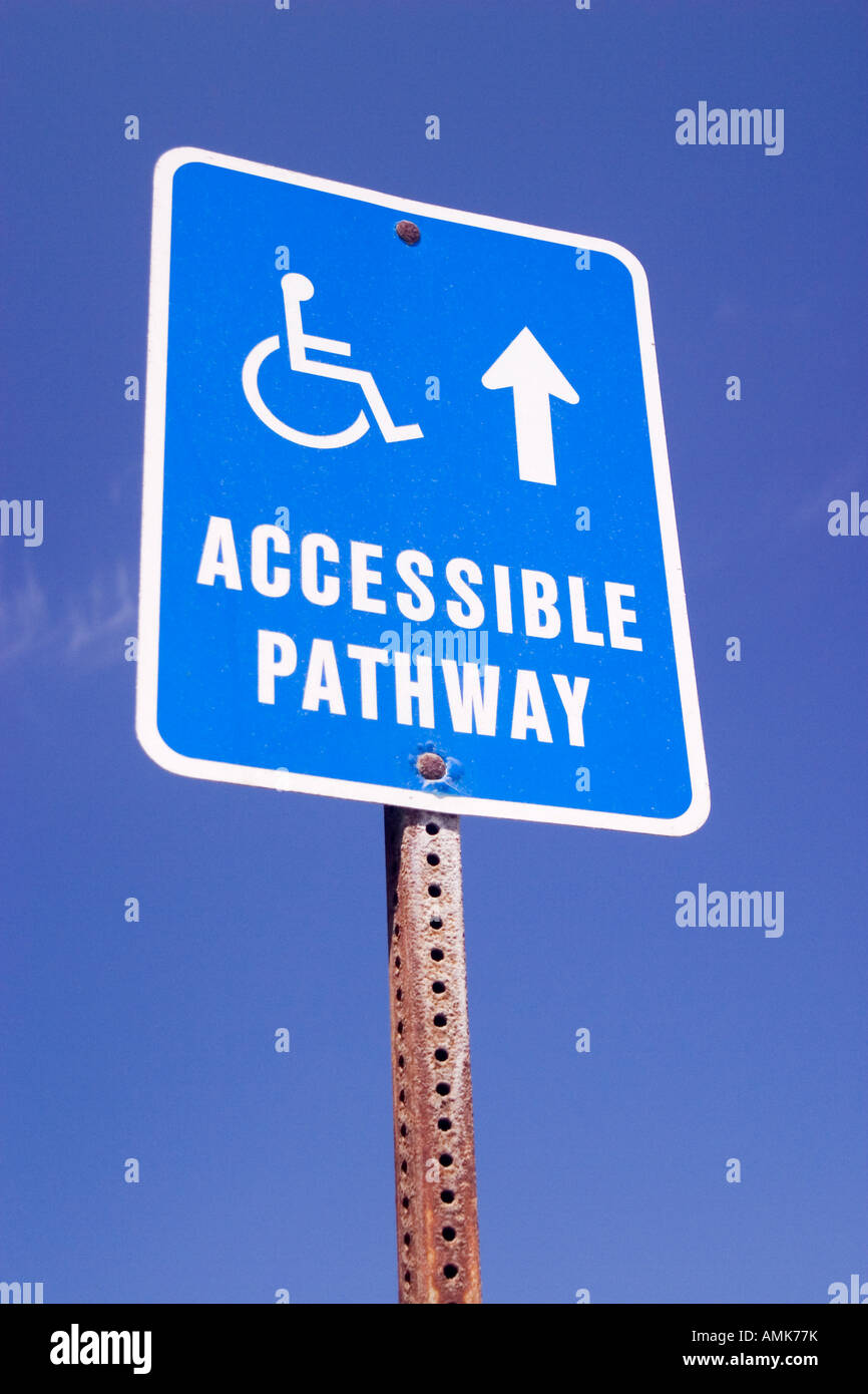Sign pointing the way to a wheelchair accessible pathway Stock Photo ...