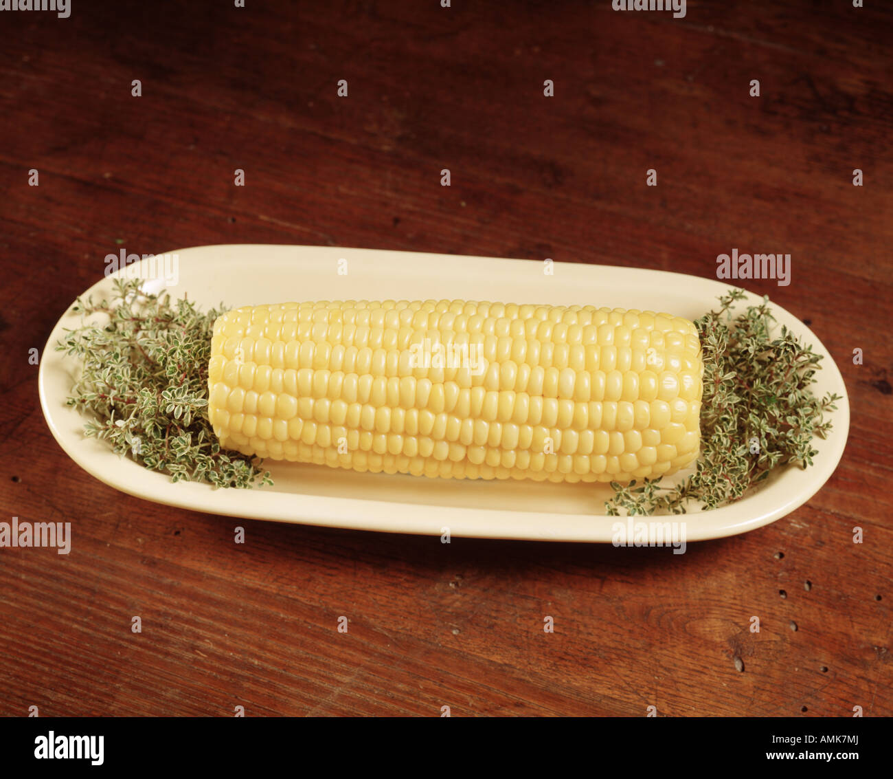 single one corn on cob yellow delicious vegetable garnish Stock Photo ...