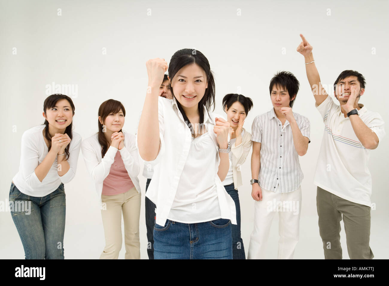 Young people cheering their friend Stock Photo - Alamy