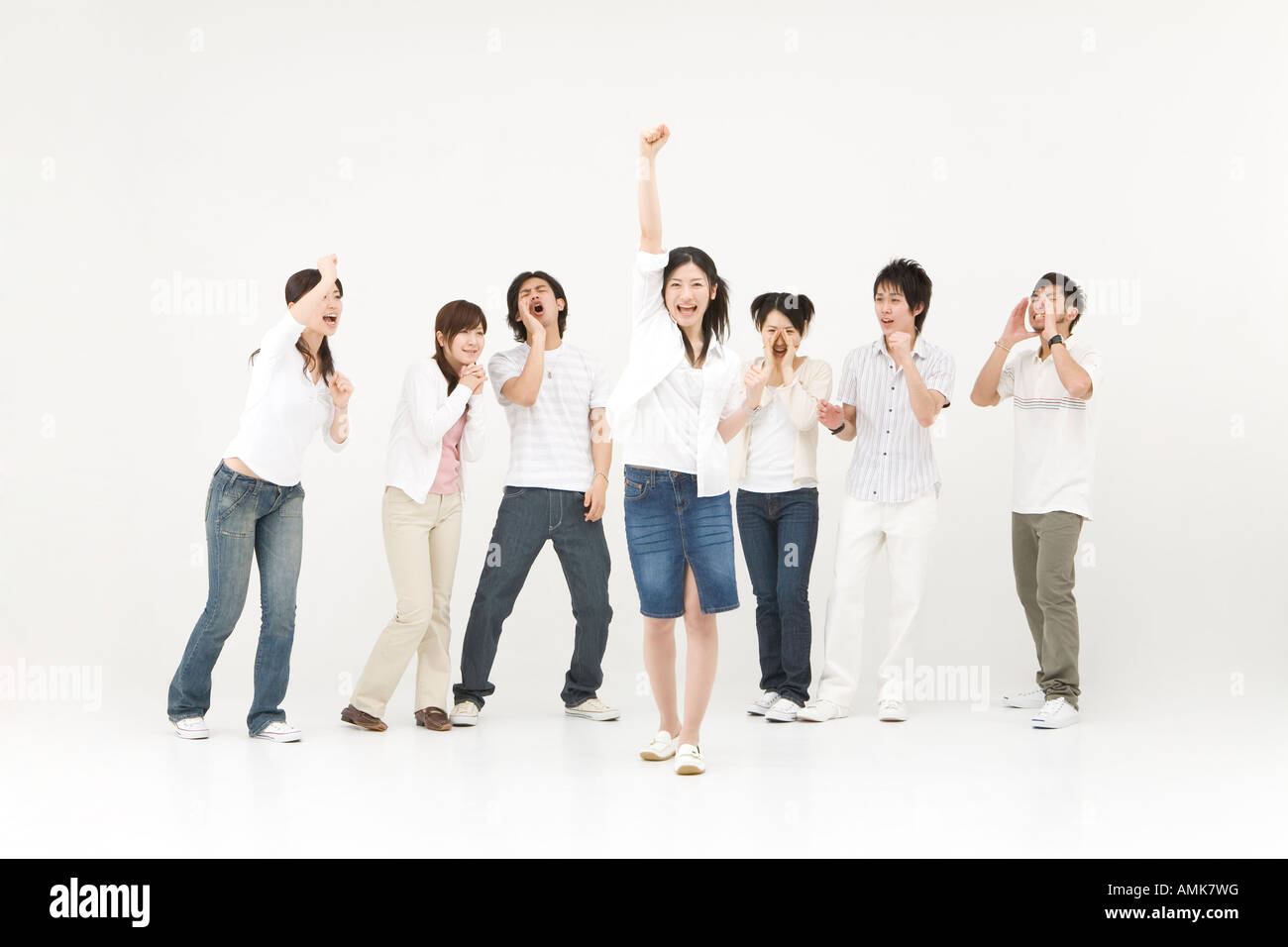 Young people cheering their friend Stock Photo - Alamy