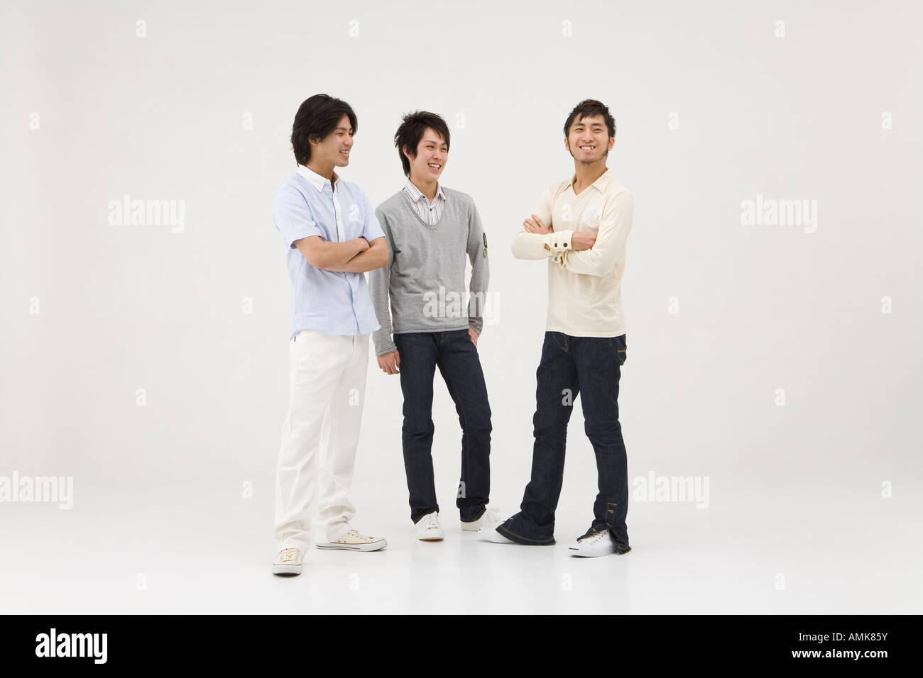 Three young men talking Stock Photo - Alamy Three young men talking Stock Photo - Alamy