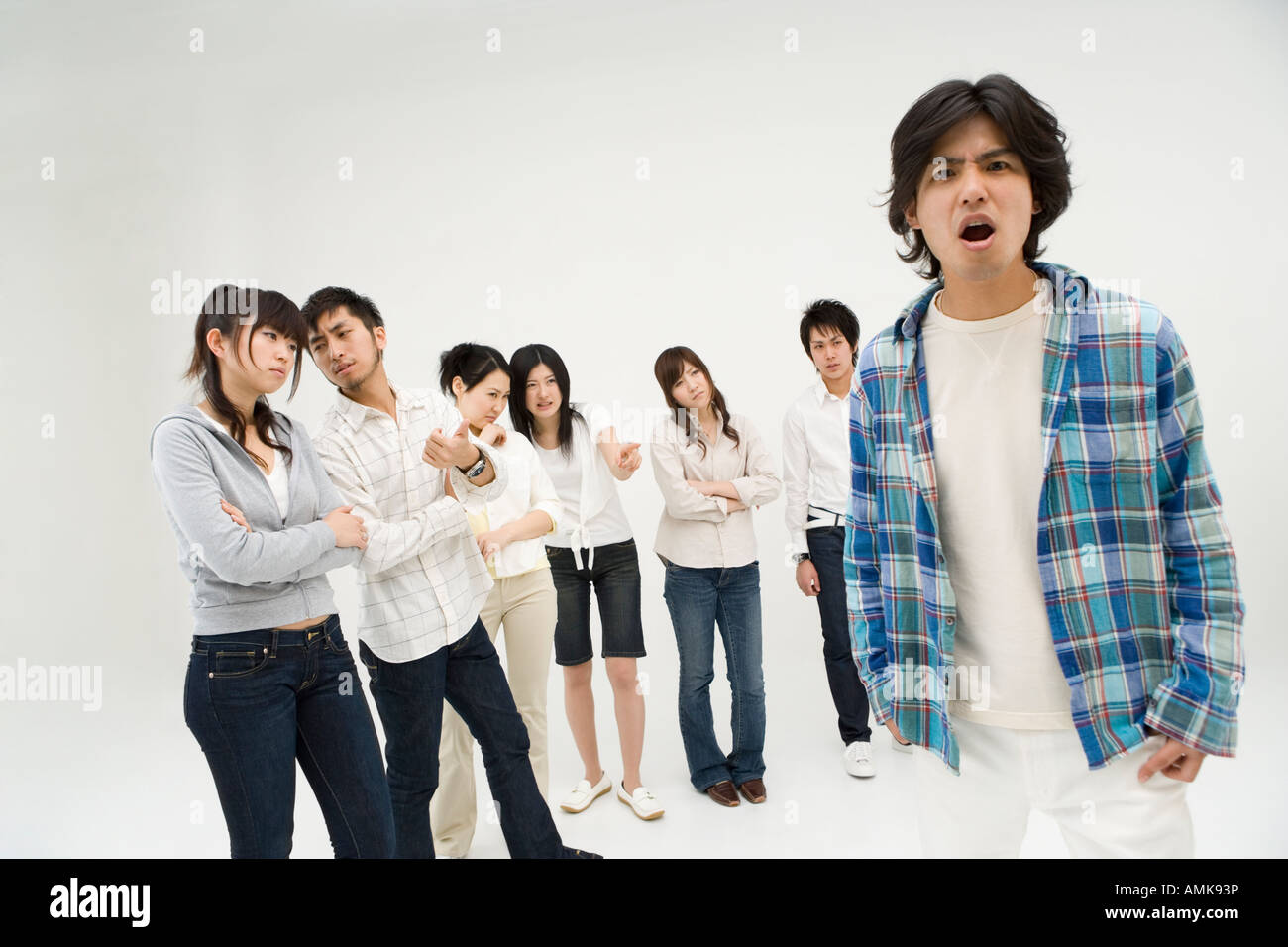 Young adults group conflict hi-res stock photography and images - Alamy