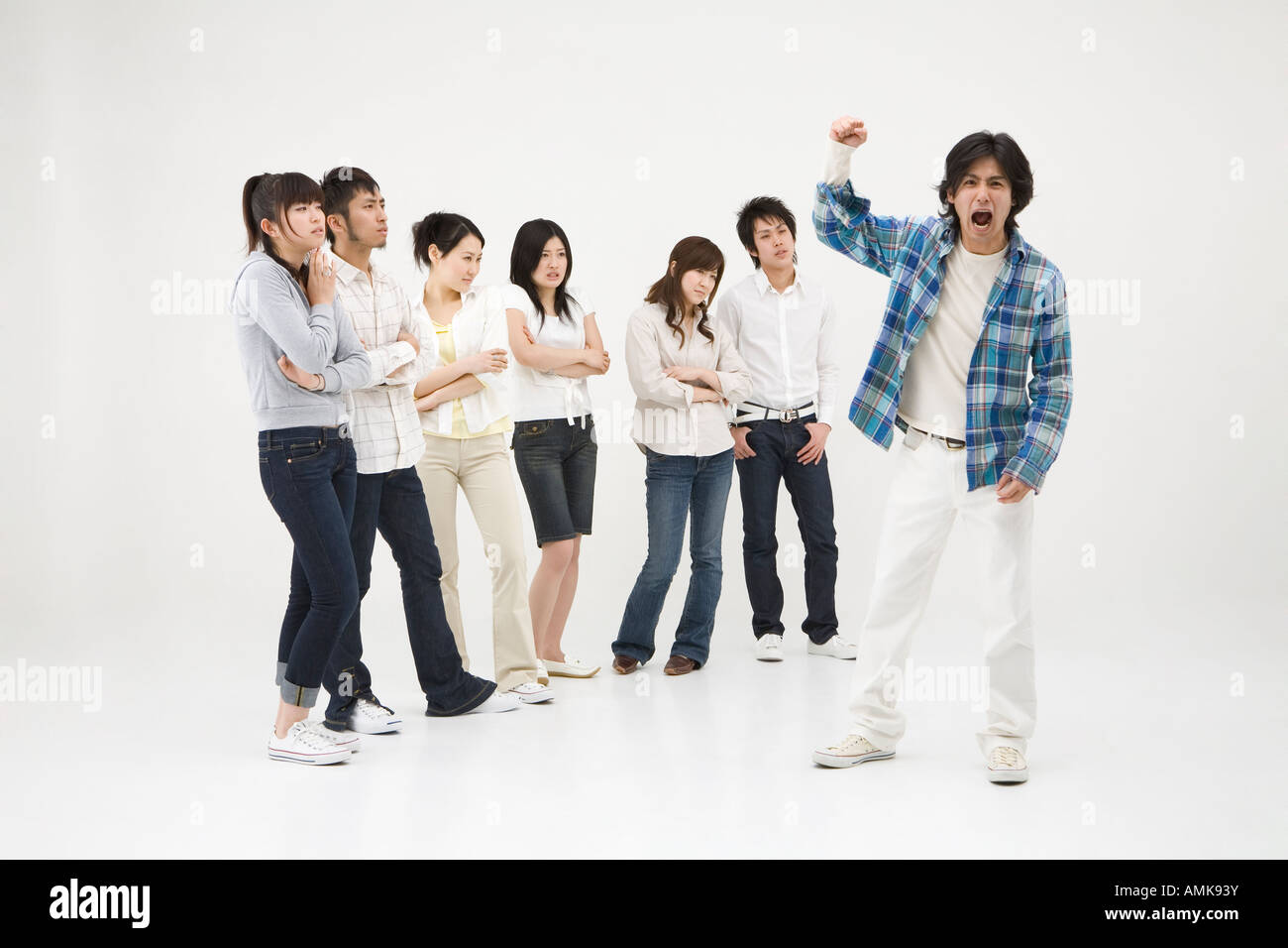 Young man excluded from group hi-res stock photography and images - Alamy