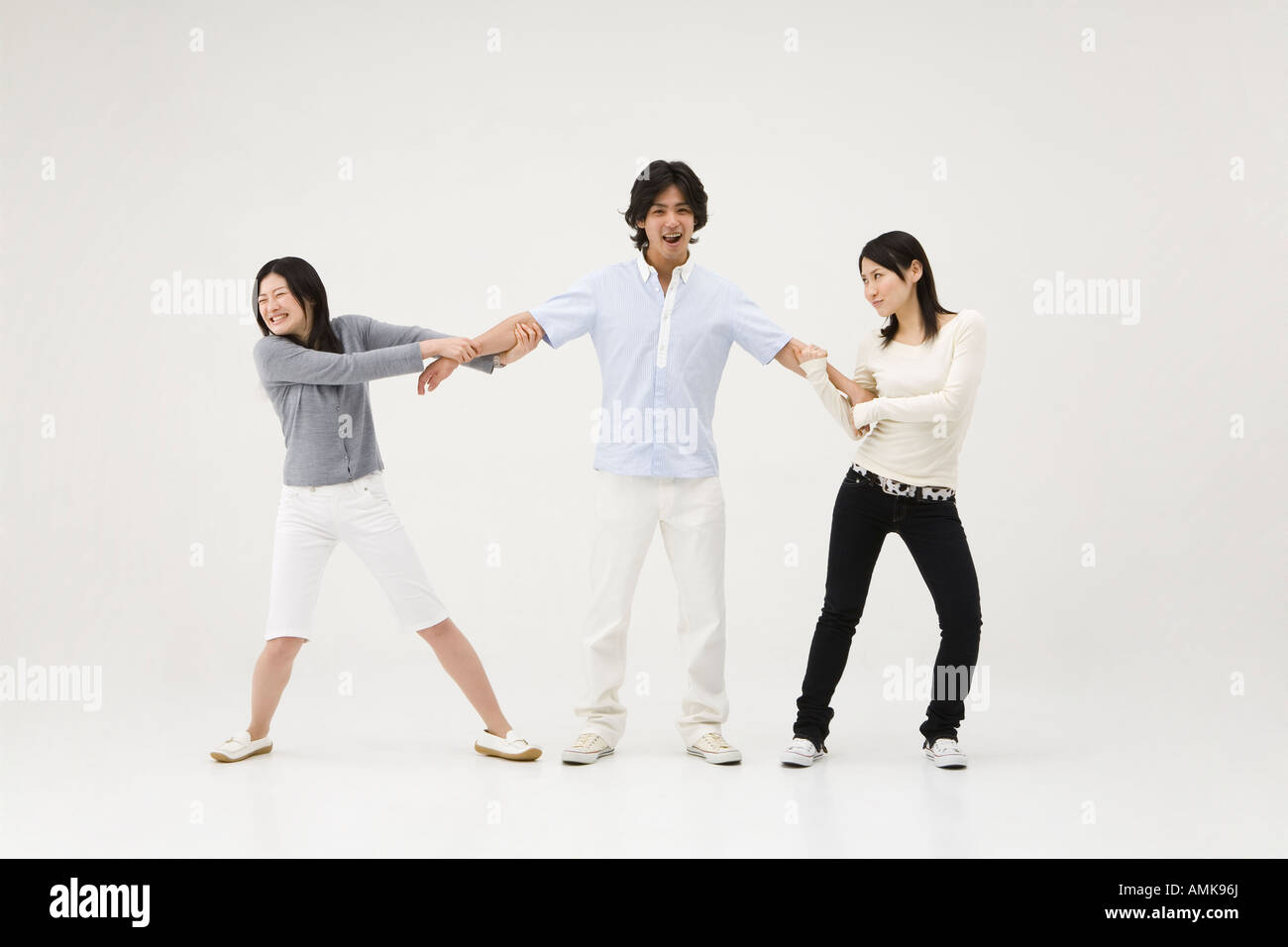 Young japanese man pulling hi-res stock photography and images - Alamy