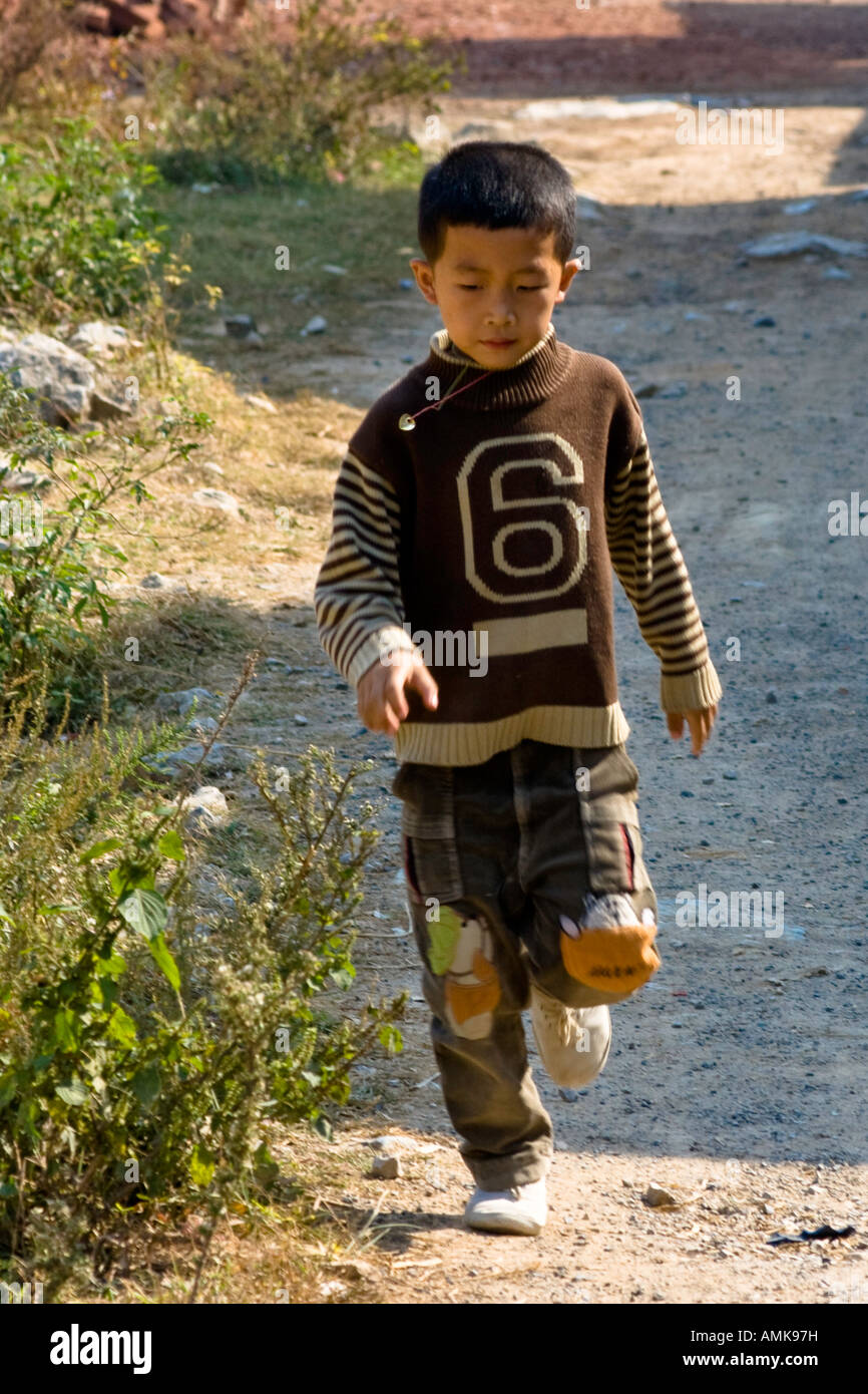 Boy Running On Dirt Road High Resolution Stock Photography and Images ...