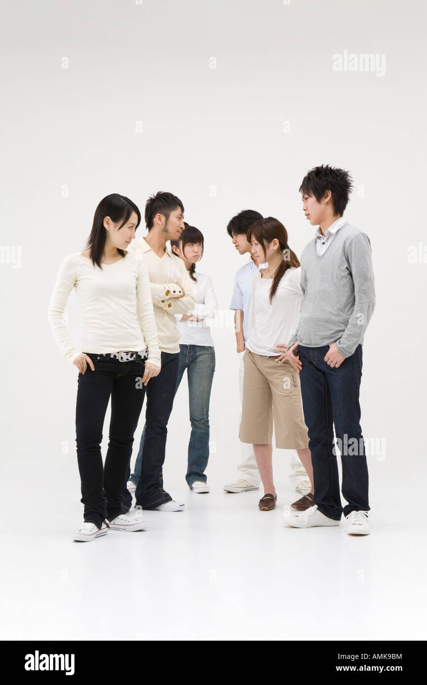 Group of people glaring at each other Stock Photo - Alamy